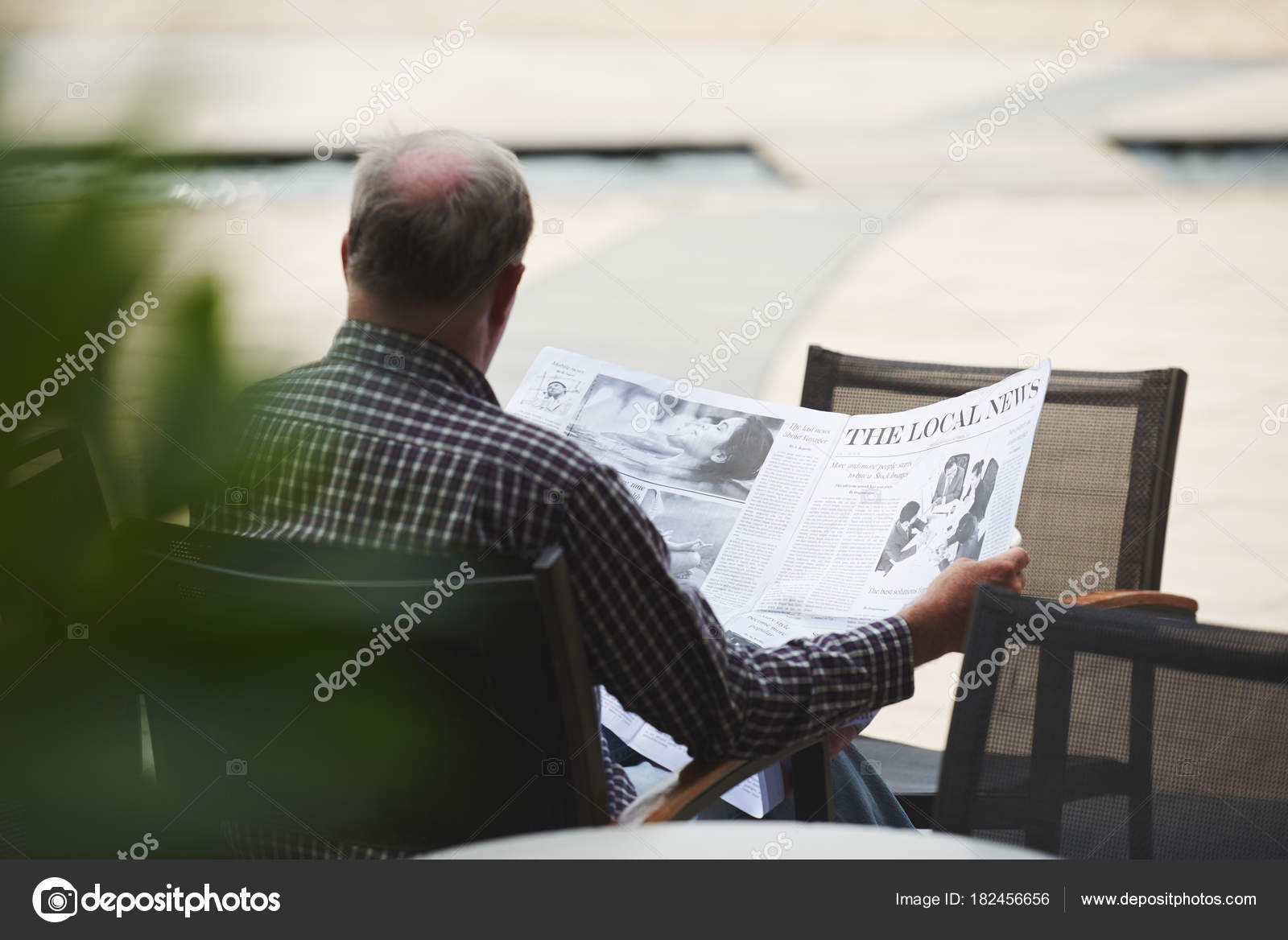 Rear View Man Reading News Local Newspaper Stock Photo by ©DragonImages ...