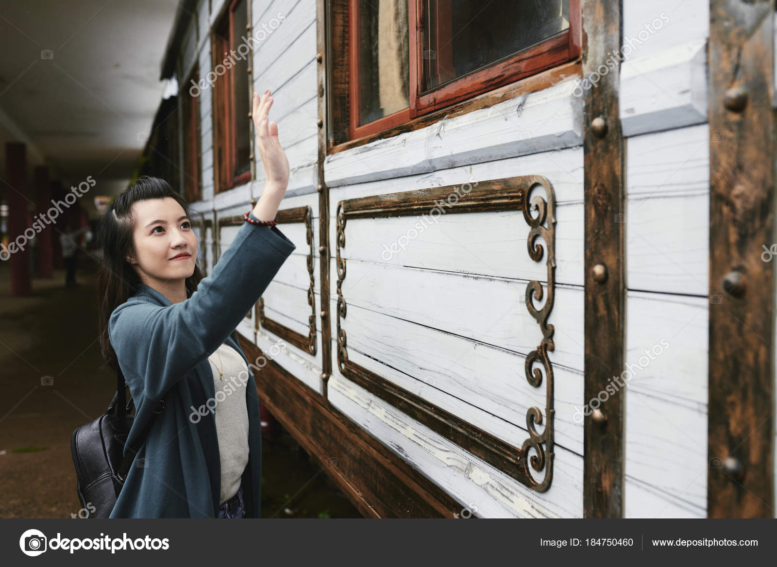 Woman Saying Goodbye Somebody Train Stock Photo by ©DragonImages 184750460