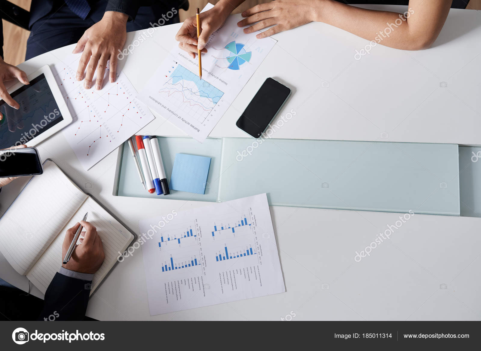 Business Team Analyzing Charts Graphs Meeting View — Stock Photo ... Business Team Analyzing Charts Graphs Meeting View — Stock Photo ...