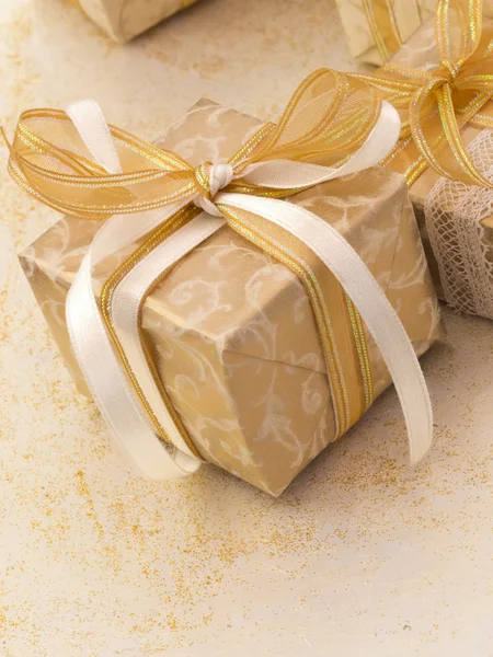 Beautiful wrapped gift box with ribbons — Stock Photo © rojoimages #5049015