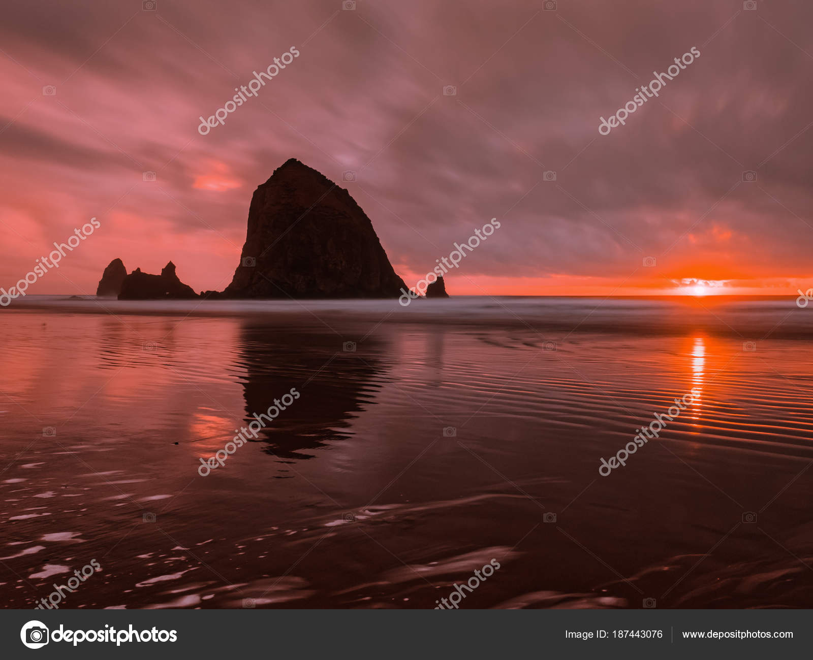 Sunset Oregon Coast Haystack Rock Silhouette Reflects Water Cannon ...