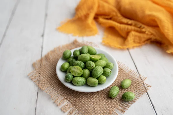 Cucamelones recién cosechados, pepino de pepinillo agrio mexicano o ...