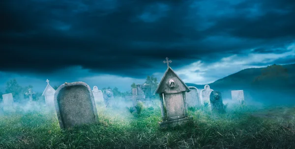 Gravestone with fog and lighting — Stock Photo © fergregory #126945428