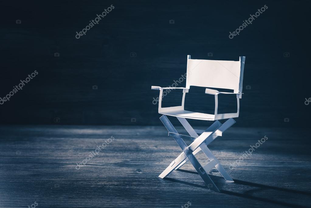 Director chair on background Stock Photo by ©fergregory 126986580