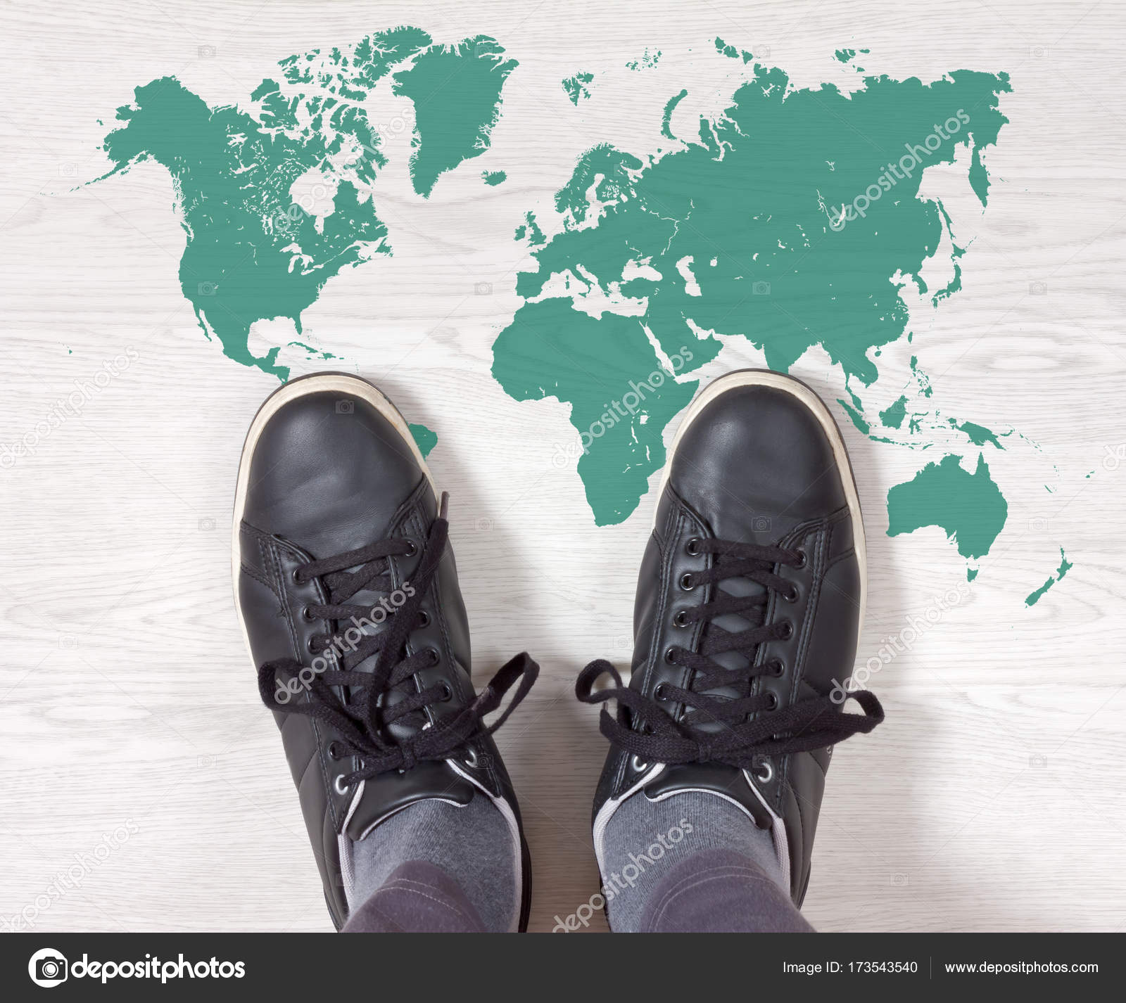 Black Sneakers on a World Map Outline Stock Photo by ©emmeci74 173543540