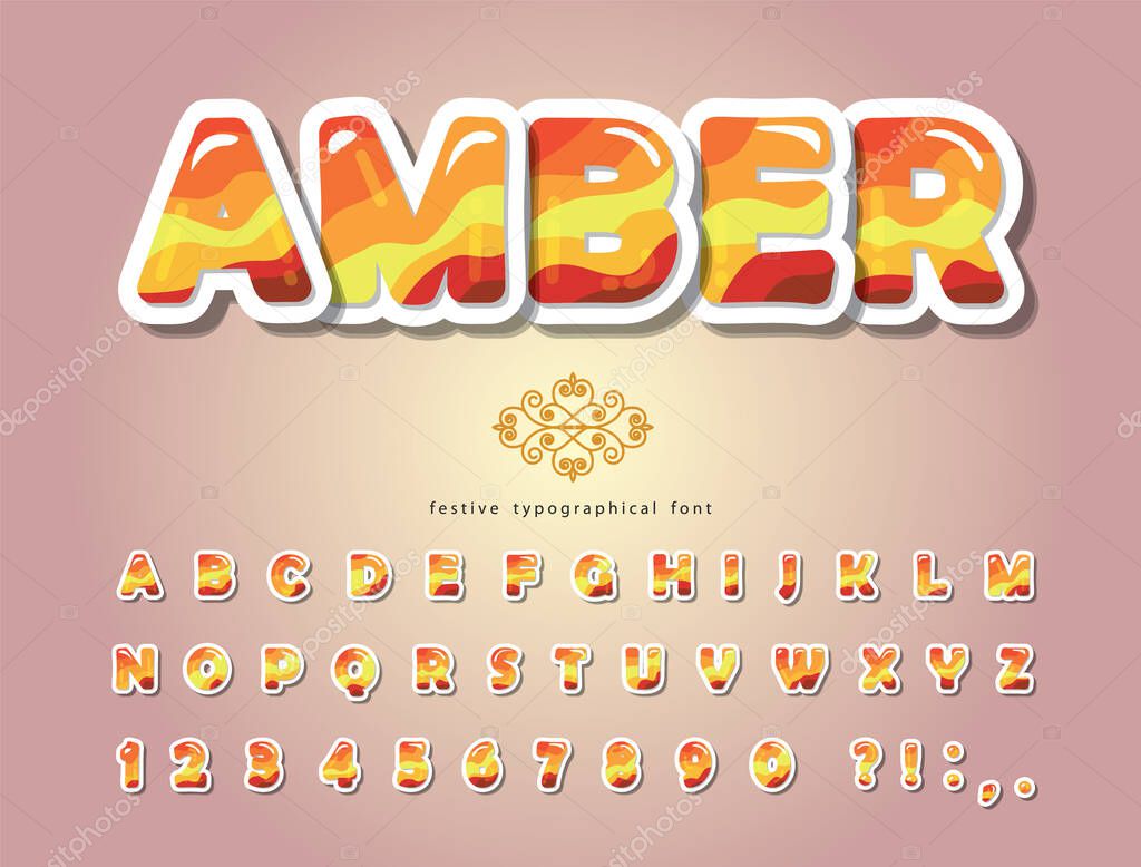 Fuente ámbar brillante. El papel de dibujos animados cortó el alfabeto ...