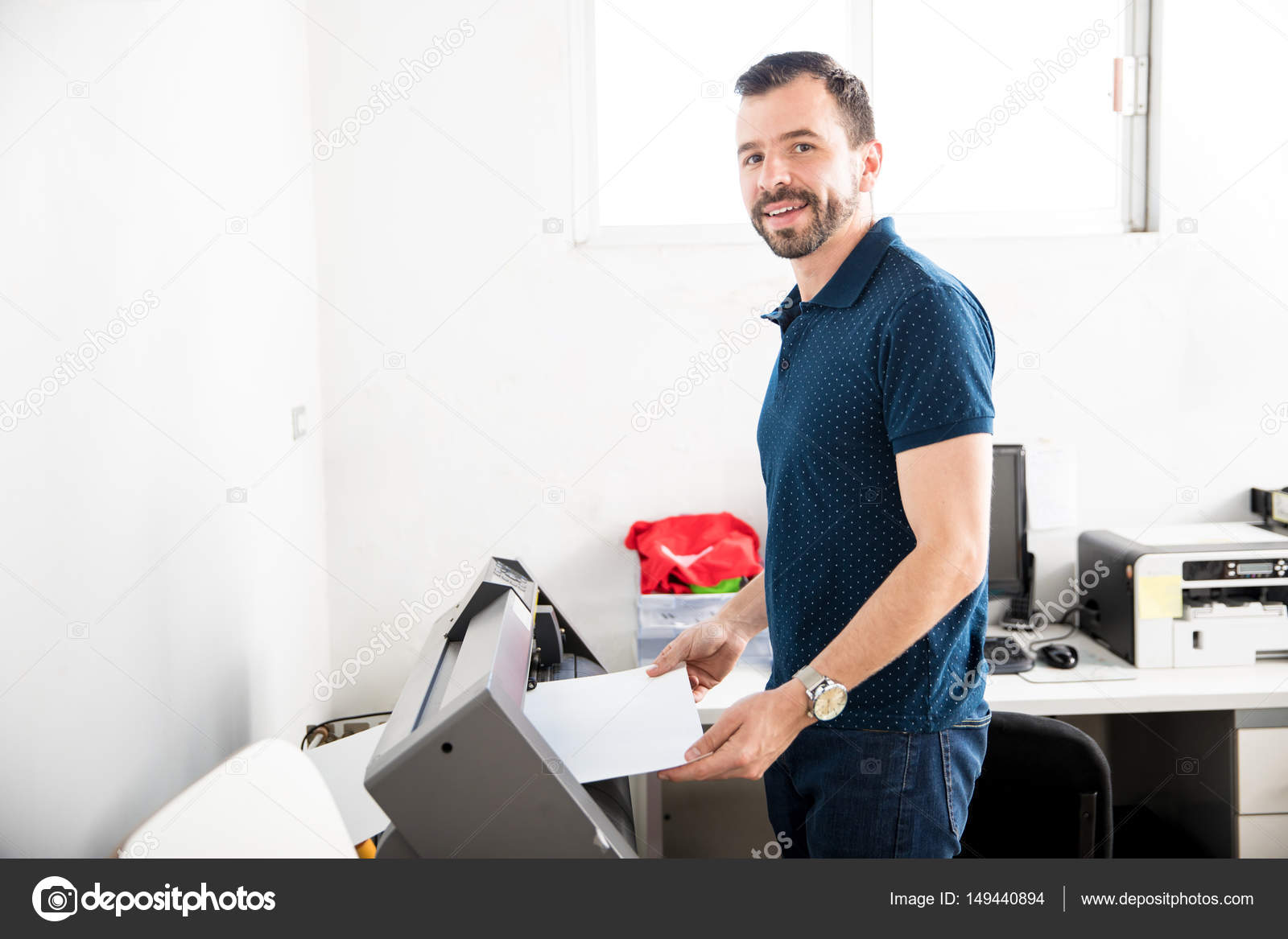 Handsome man printing labels — Stock Photo © tonodiaz #149440894