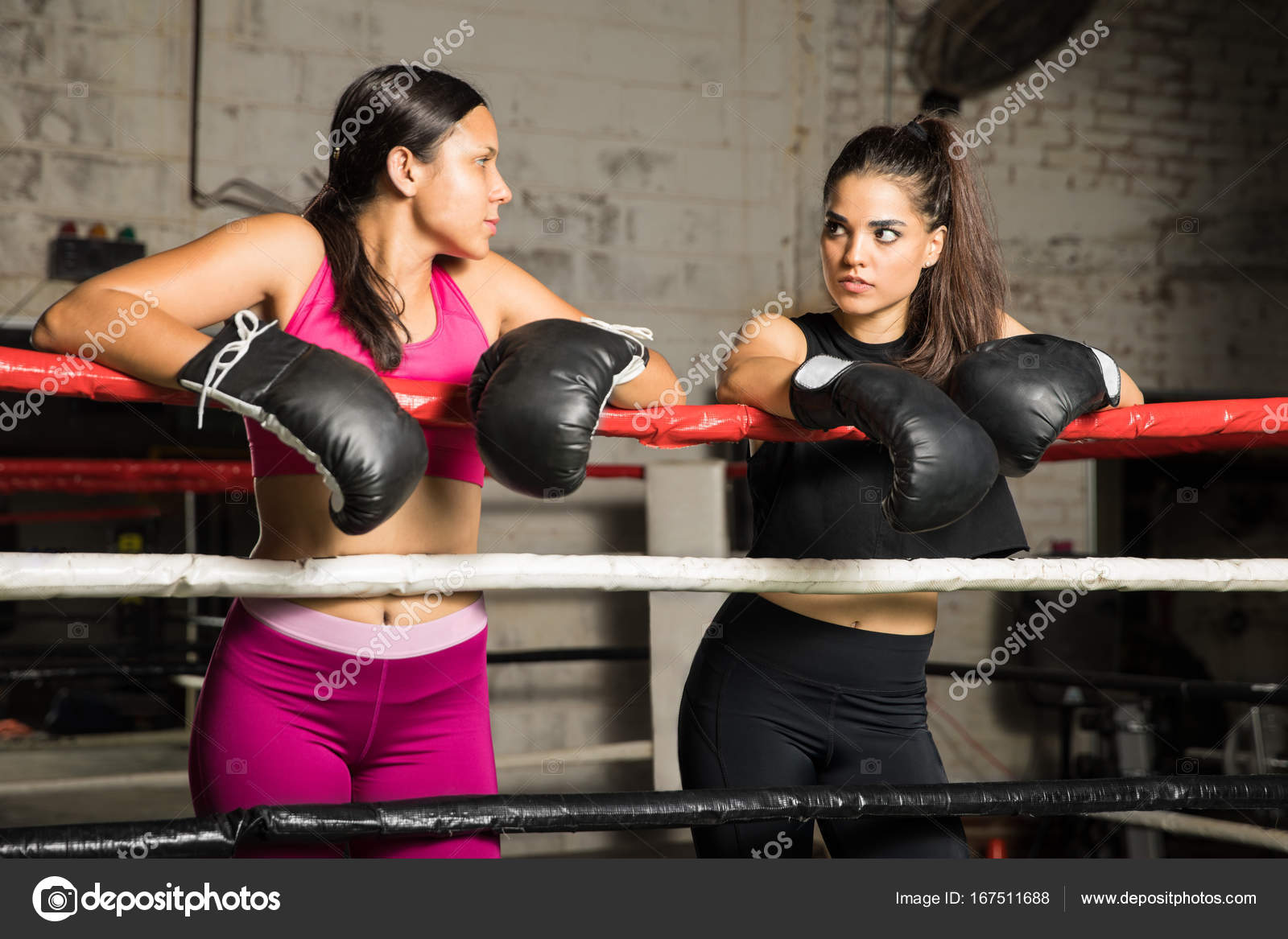 Women getting ready for a box fight Stock Photo by ©tonodiaz 167511688