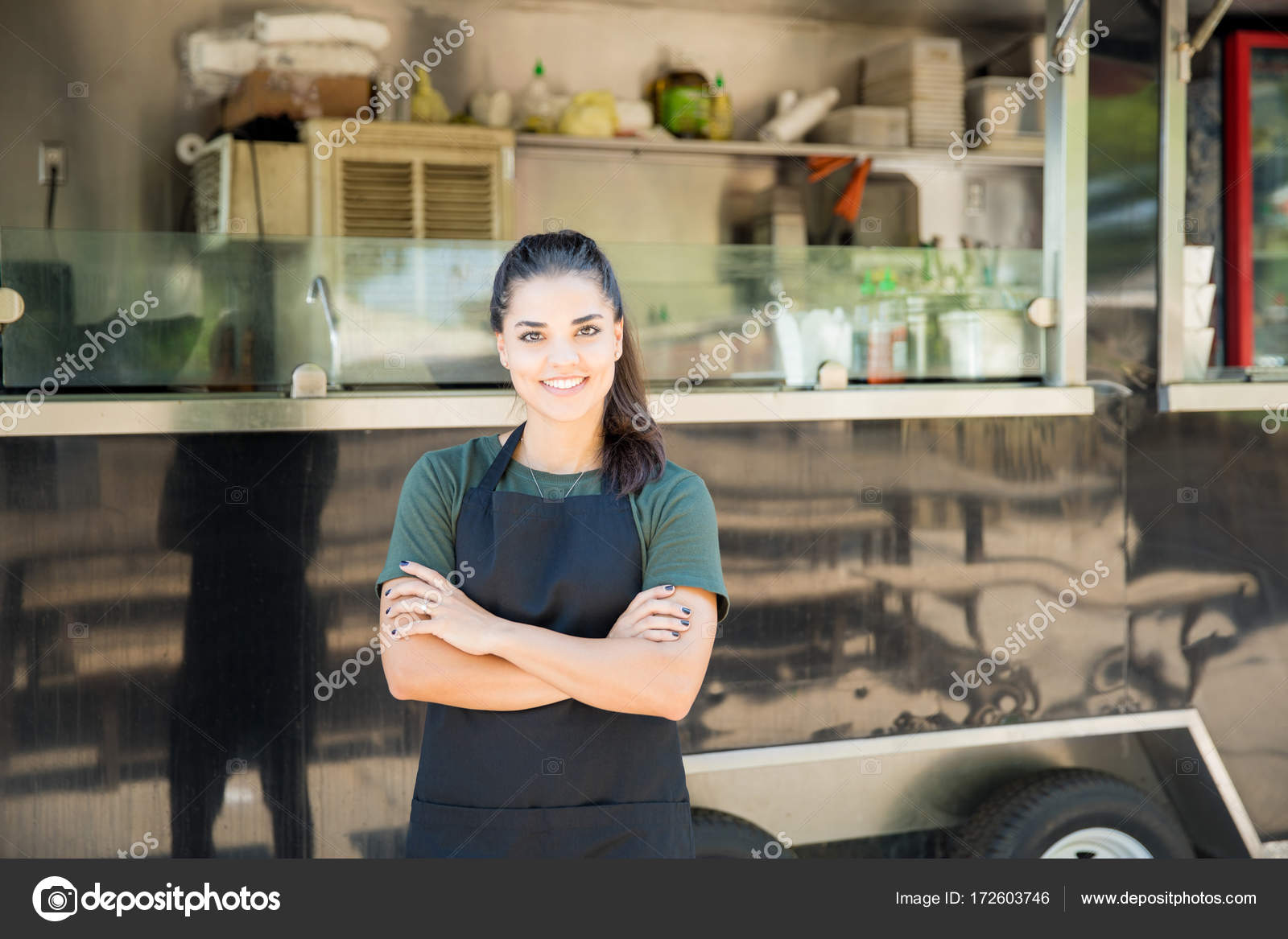 Pretty female chef with a food truck Stock Photo by ©tonodiaz 172603746