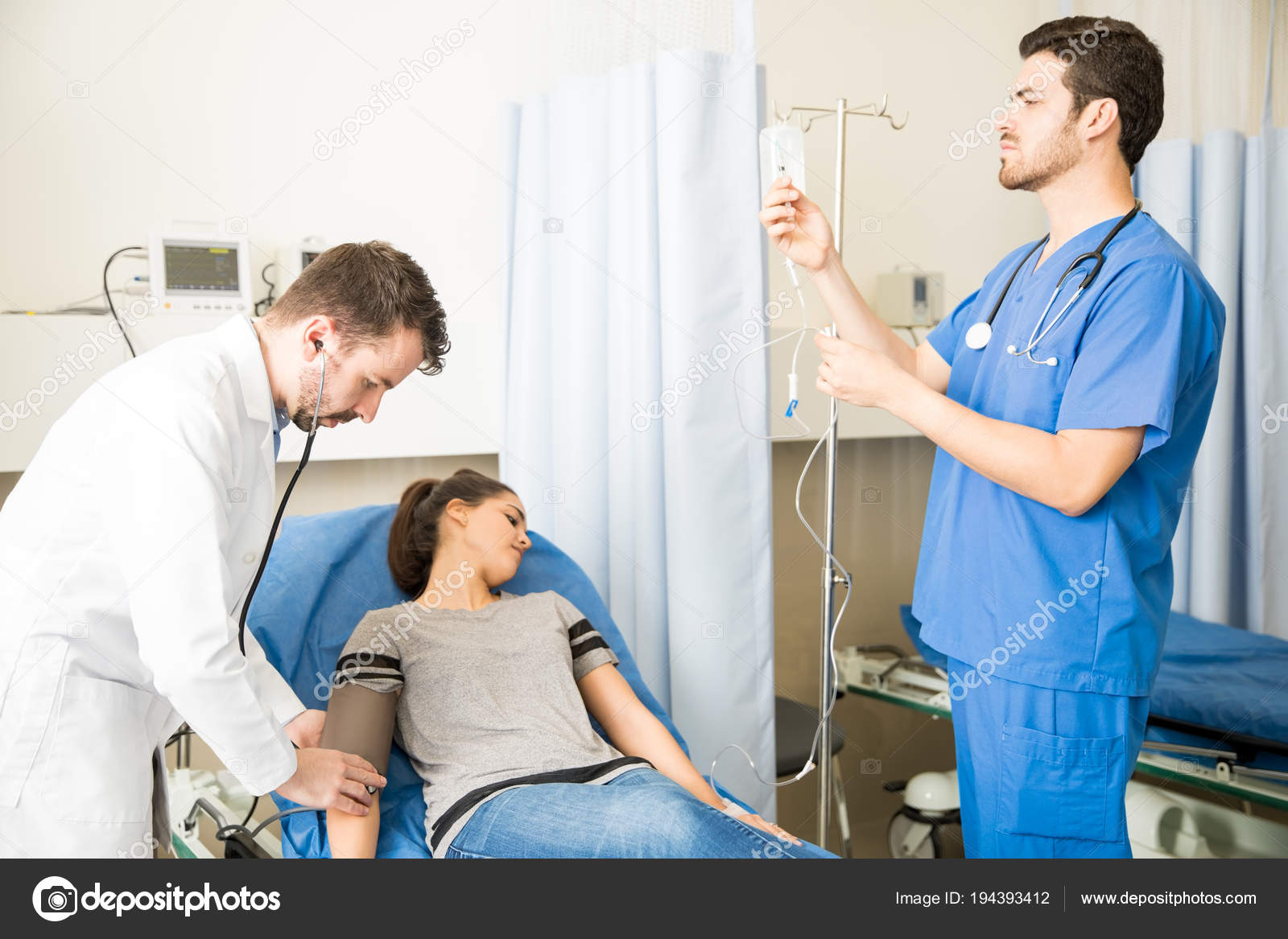 Two Paramedic Doctors Working Unconscious Female Patient Emergency Room ...