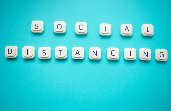 Social distancing message with game letter blocks, with the letters ...