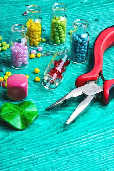 Hobby crafts of beads. Stock Photo by ©Nikolay_Donetsk 148238705