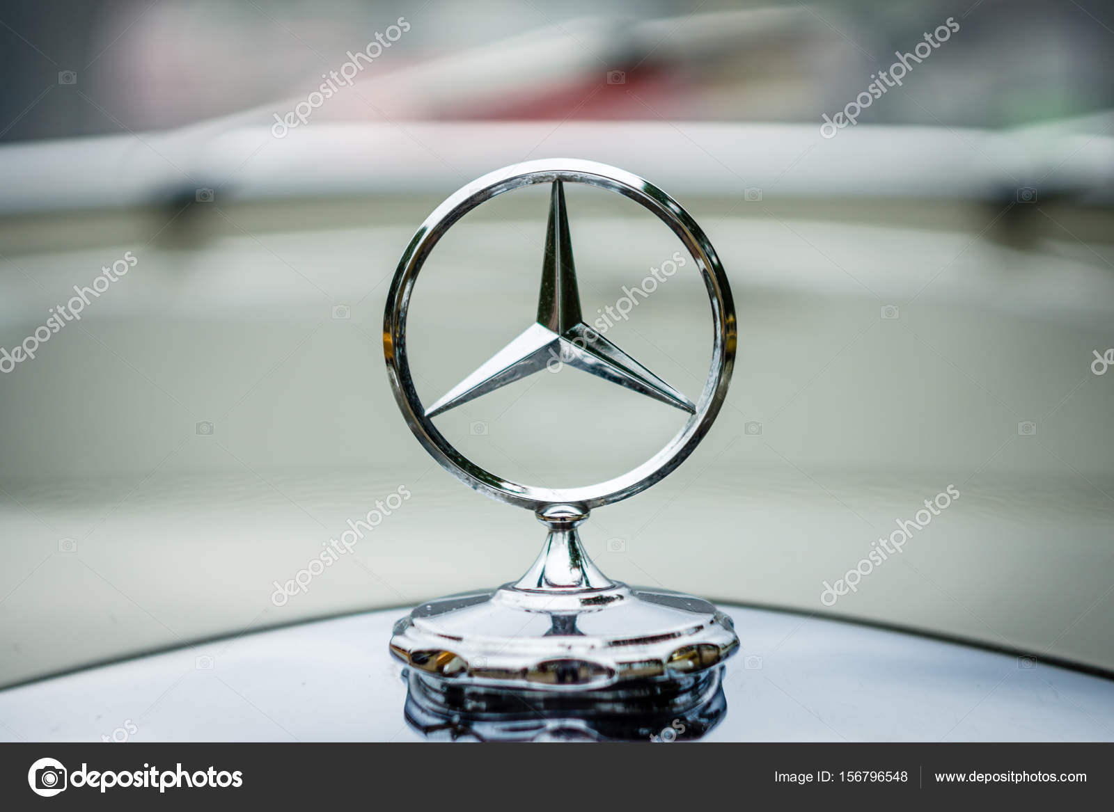 The famous three-beam star of Mercedes-Benz. Hood ornament, close-up ...