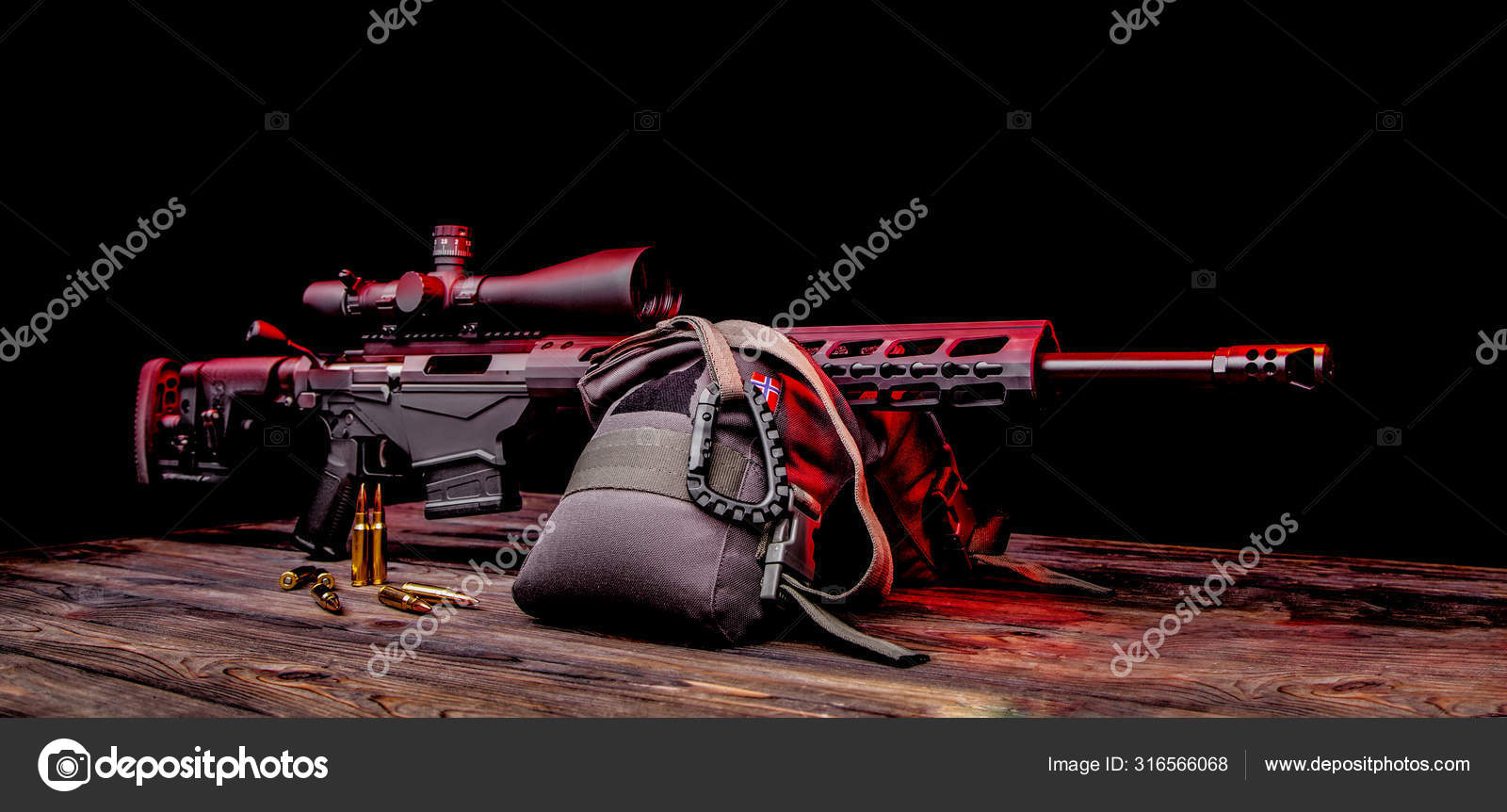 Modern sniper rifle in red backlight on a dark background. Long Stock ...