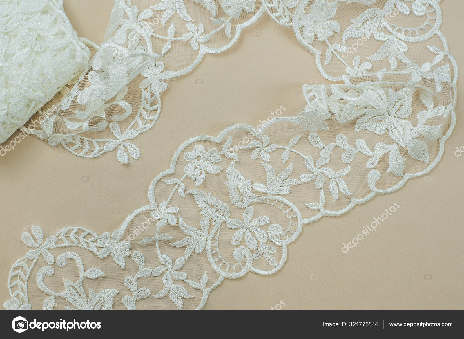 Texture lace fabric. lace on white background studio. thin fabric made ...