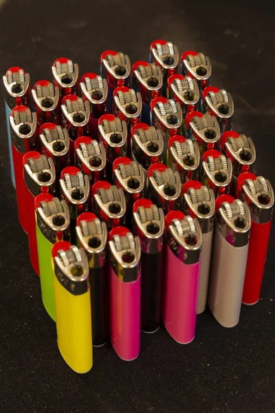 set of lighters photographed with various angles, compositions and sets ...