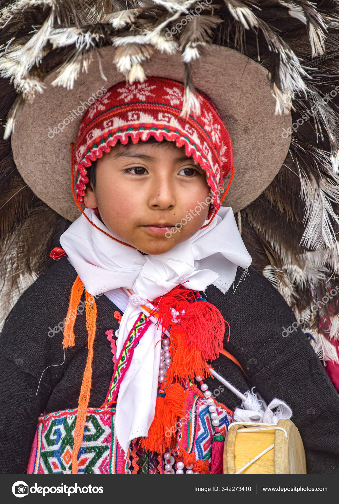 An Andean boy dressed in traditional clothing for a procession in Lima ...