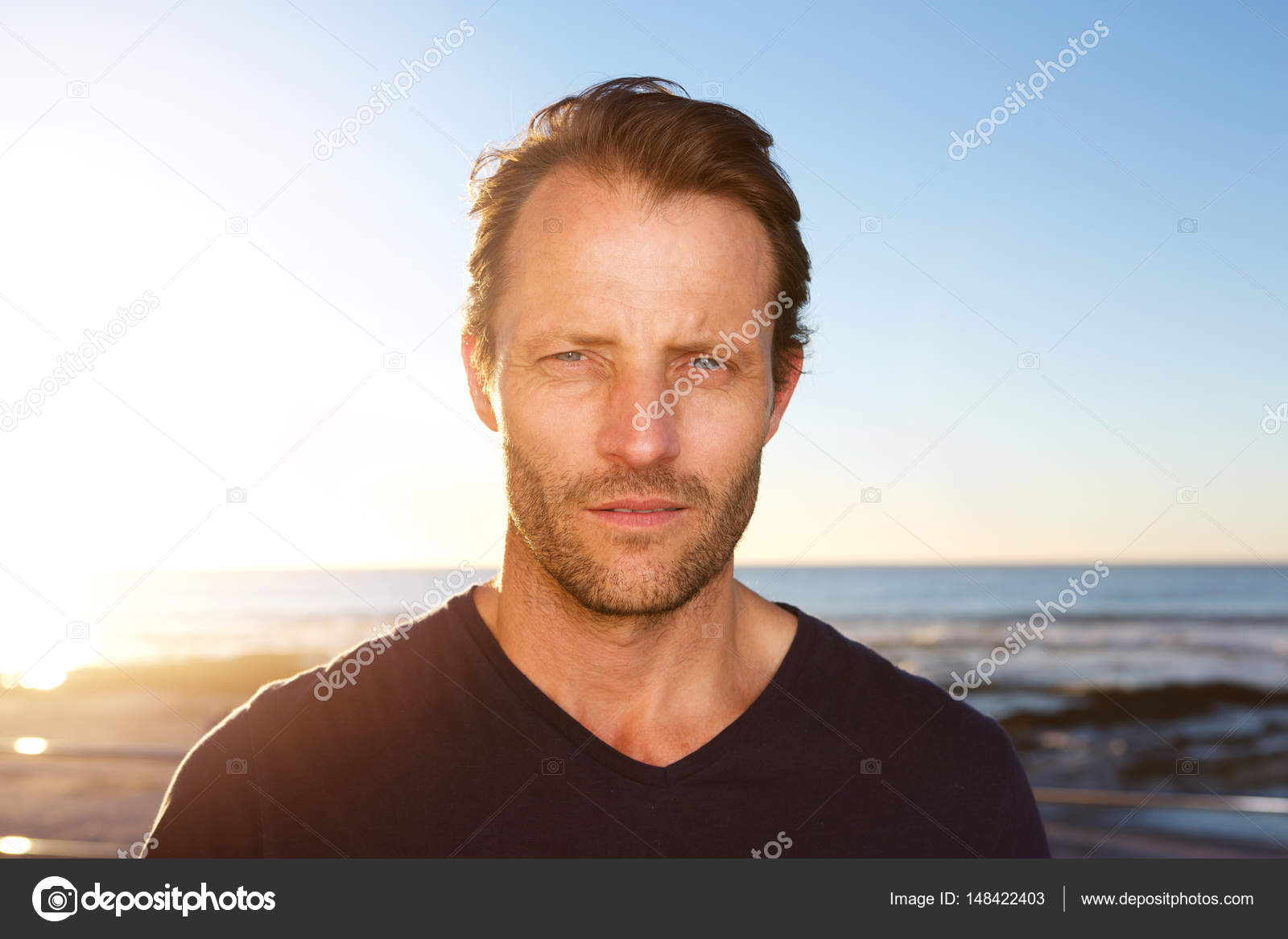 Man standing outside Stock Photo by ©mimagephotos 148422403