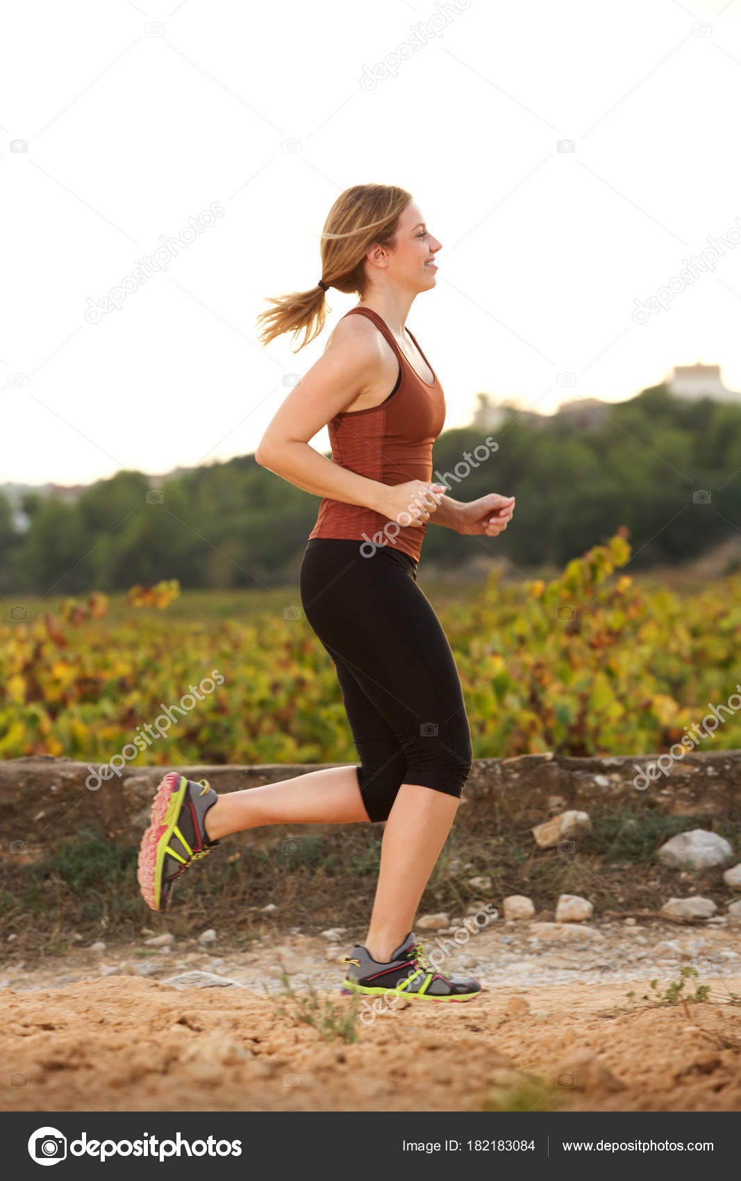 Full Length Profile Portrait Healthy Young Woman Running Stock Photo by ...