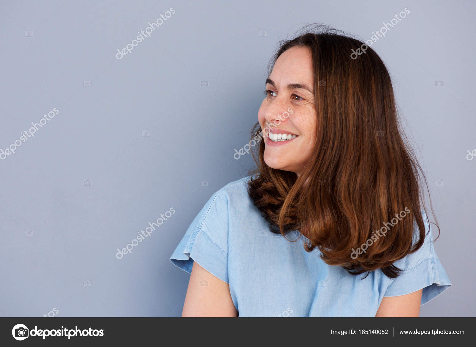 Close Portrait Attractive Older Woman Smiling Gray Wall Stock Photo by ©mimagephotos 185140052