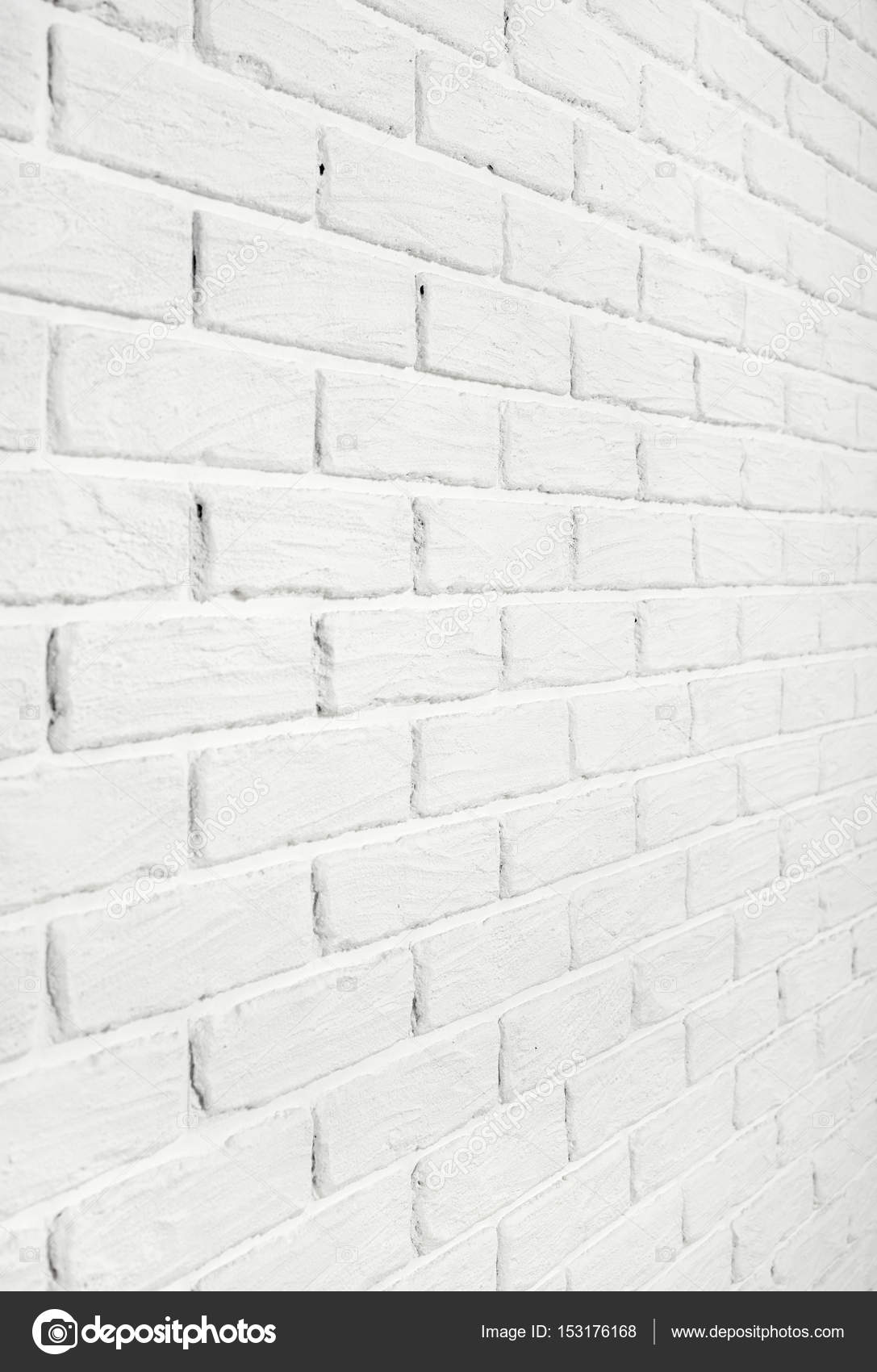 White brick wall, angle view, abstract background photo Stock Photo by ...