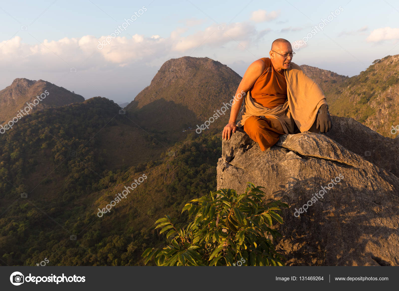 Buddhist Monk Meditating On Mountain Buddhist Monk Meditating On Mountain
