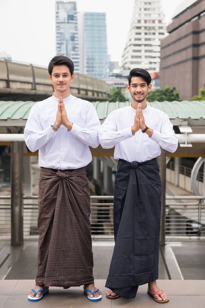 Handsome Myanmar men welcome hand sign — Stock Photo © blanscape #183998406