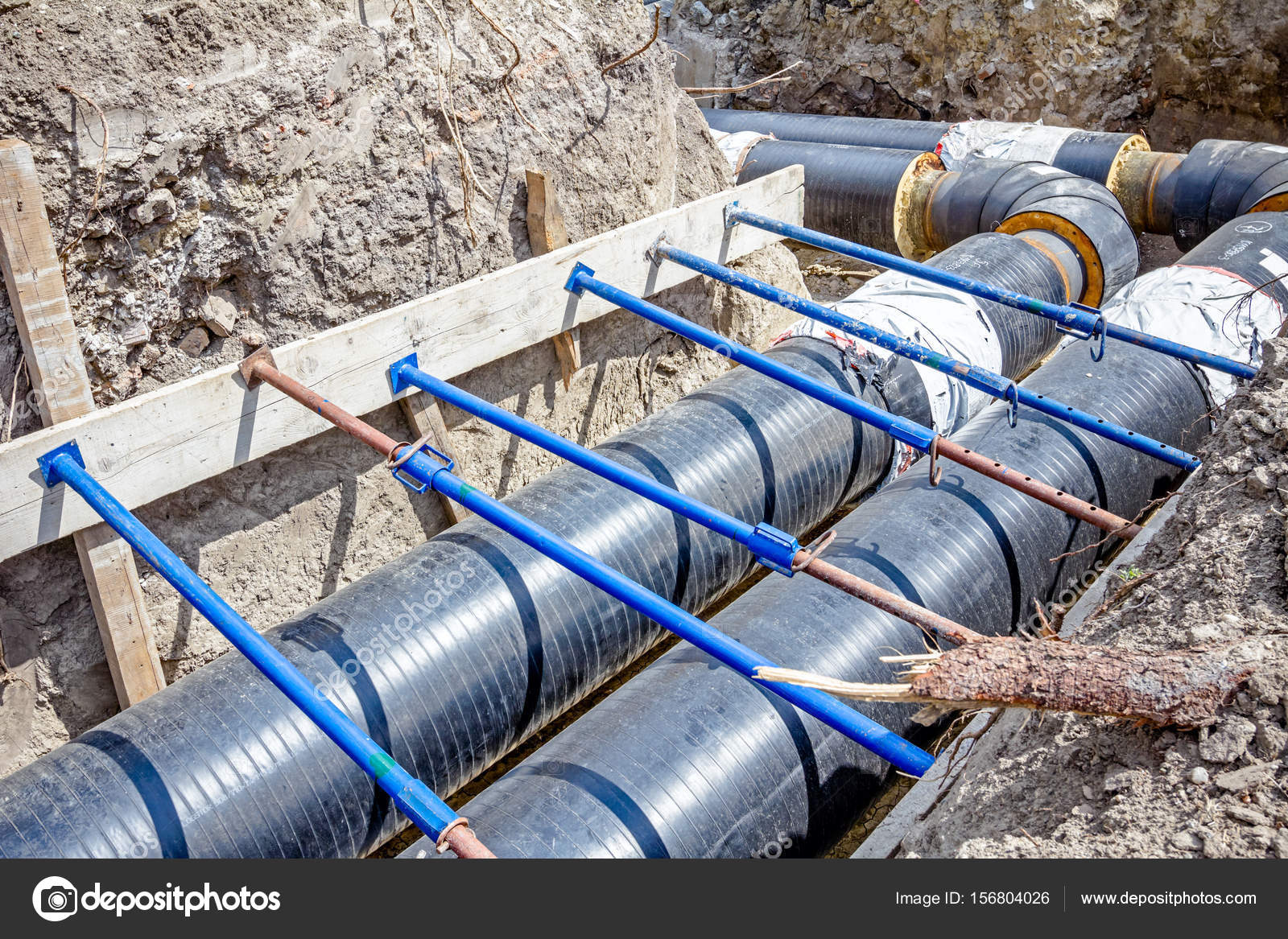 Shoring supports walls of a trench to protect workers Stock Photo by ...