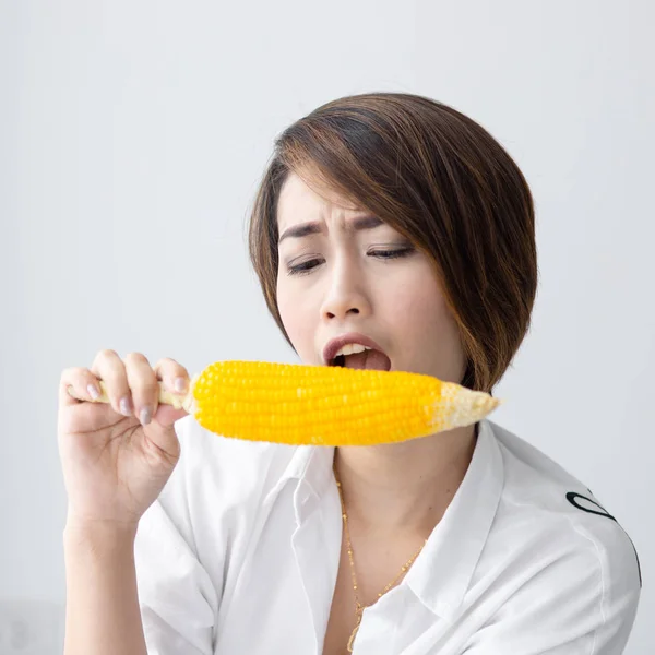 Older woman eating corn on the cob Stock Photos, Royalty Free Older ...