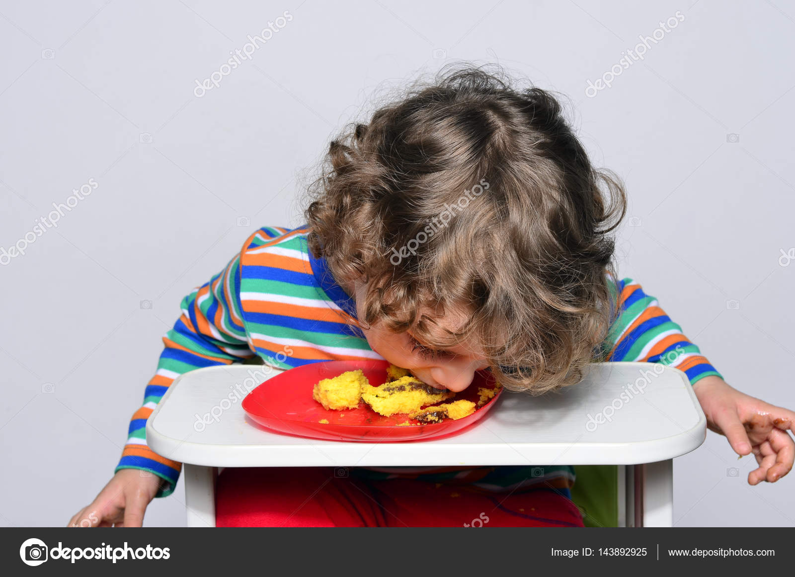 Messy Kid Eating Cake
