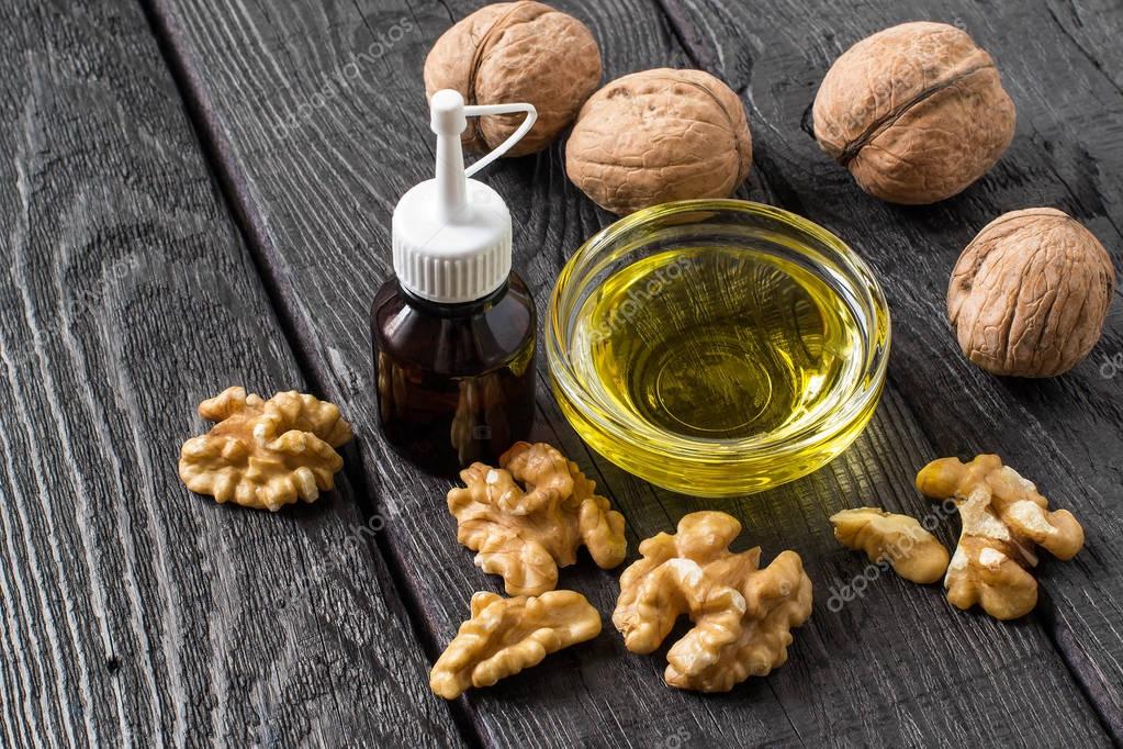 Walnuts and walnut oil Stock Photo by ©13-Smile 130193500