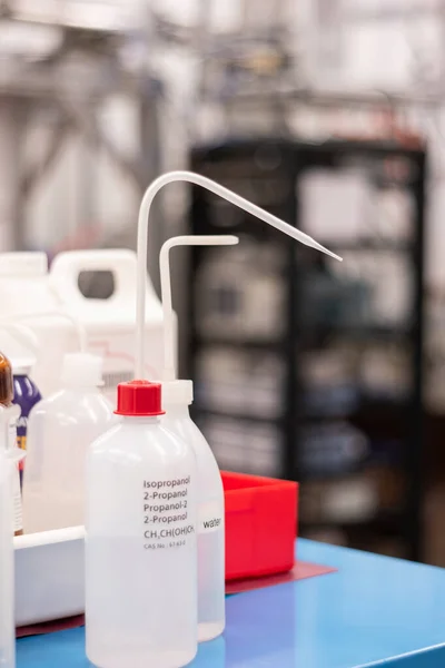 Set of empty plastic chemical bottles with straws in a lab envir Stock ...