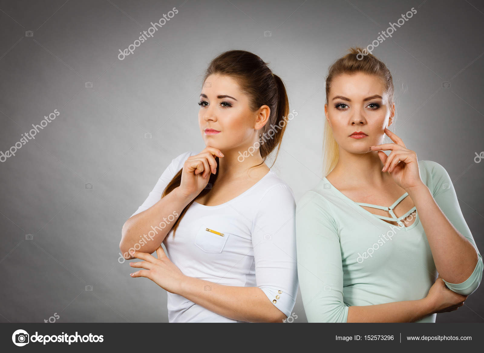 Two women thinking about something — Stock Photo © Voyagerix #152573296