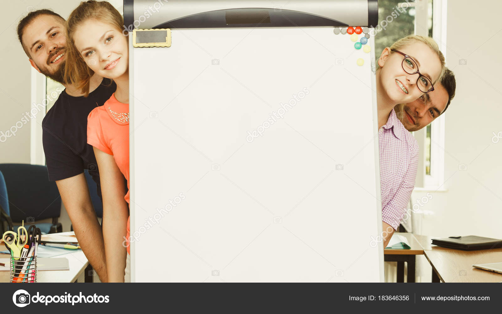 Group of students and board Stock Photo by ©Voyagerix 183646356