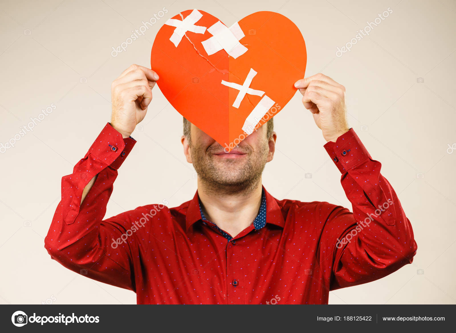 Smiling man with healed heart. — Stock Photo © Voyagerix #188125422