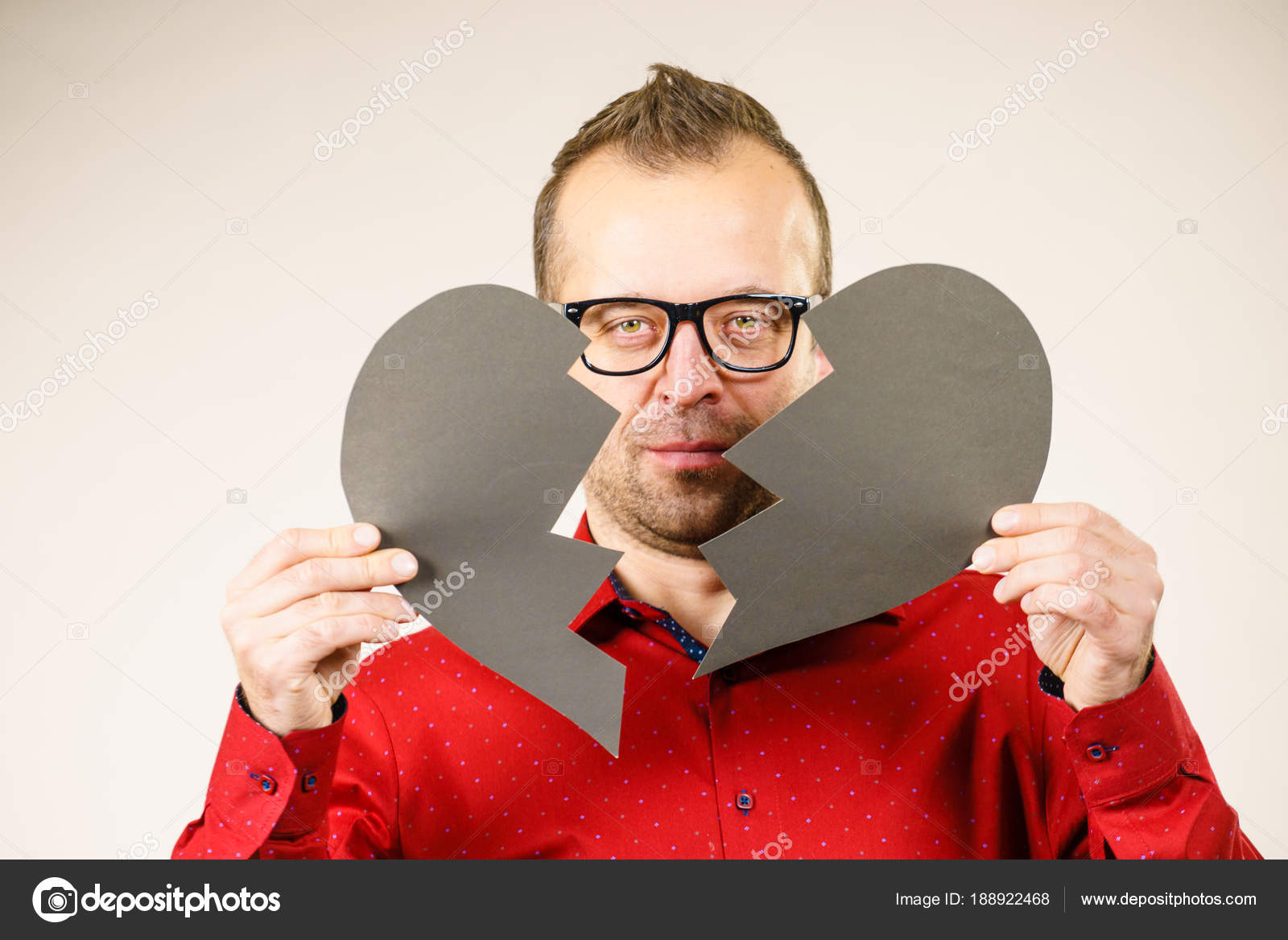 Sad man with broken heart. Stock Photo by ©Voyagerix 188922468