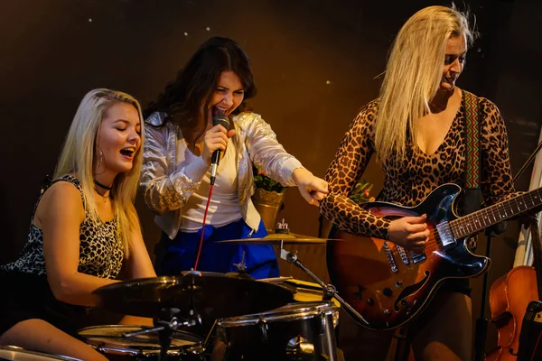 Rock band on stage Stock Photo by ©TarasMalyarevich 150798870