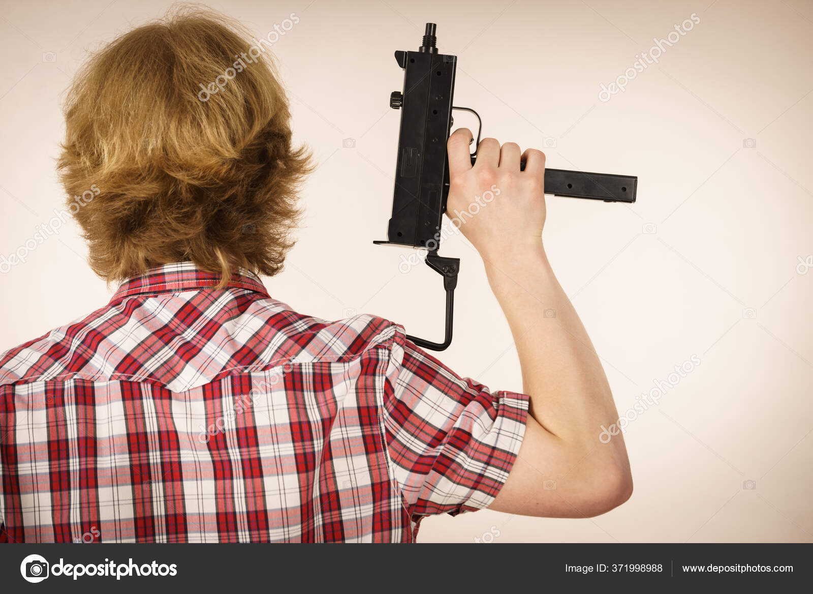 Young Unrecognizable Man Standing Backwards Holding Gun Private Weapon ...