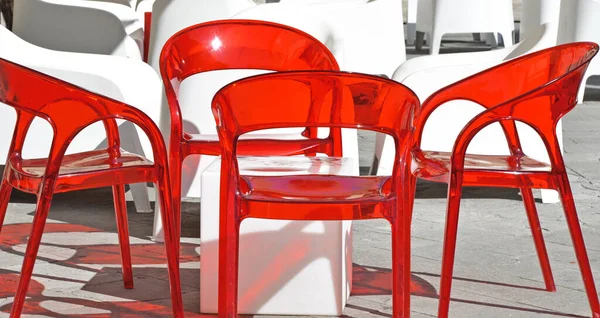 Red plastic chairs Stock Photos, Royalty Free Red plastic chairs Images ...