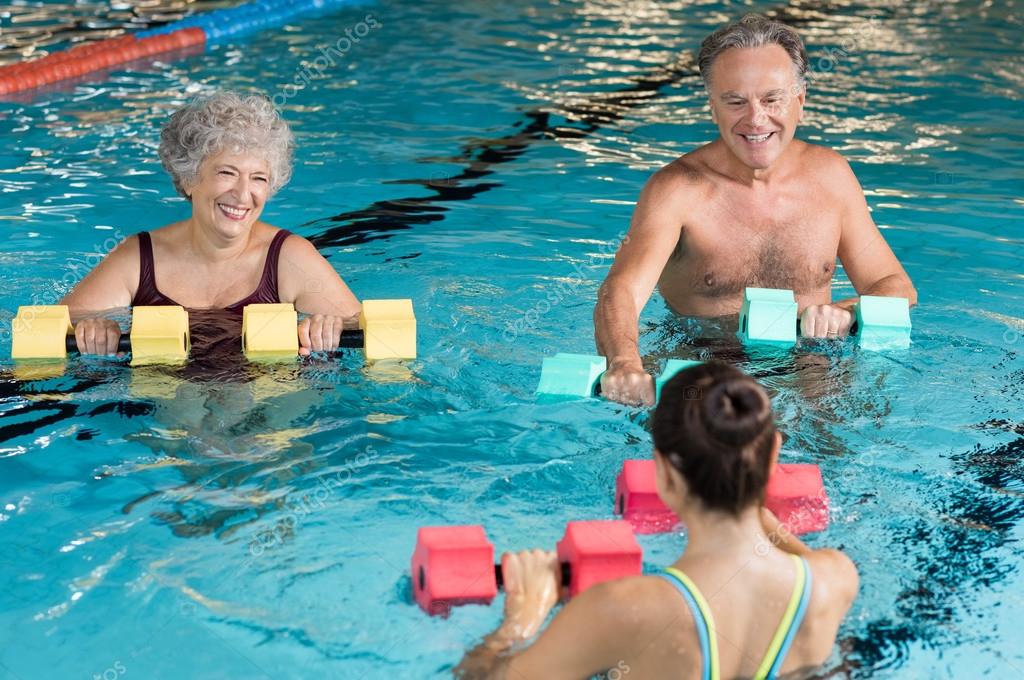 Seniors doing aqua aerobics — Stock Photo © ridofranz #125951020