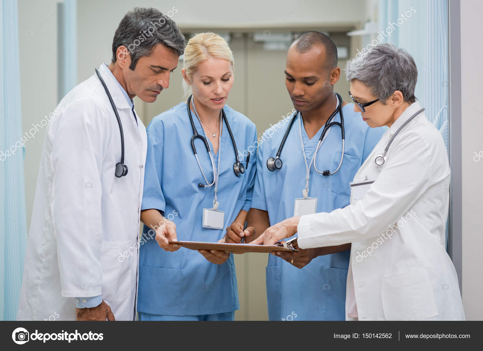 Group of doctors meeting Stock Photo by ©ridofranz 150142562