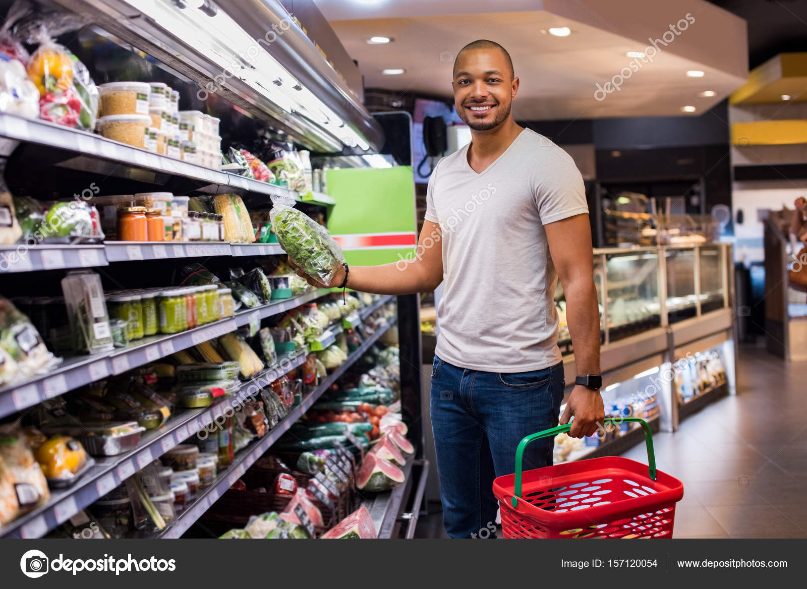 Man buying vegetables Stock Photo by ©ridofranz 157120054