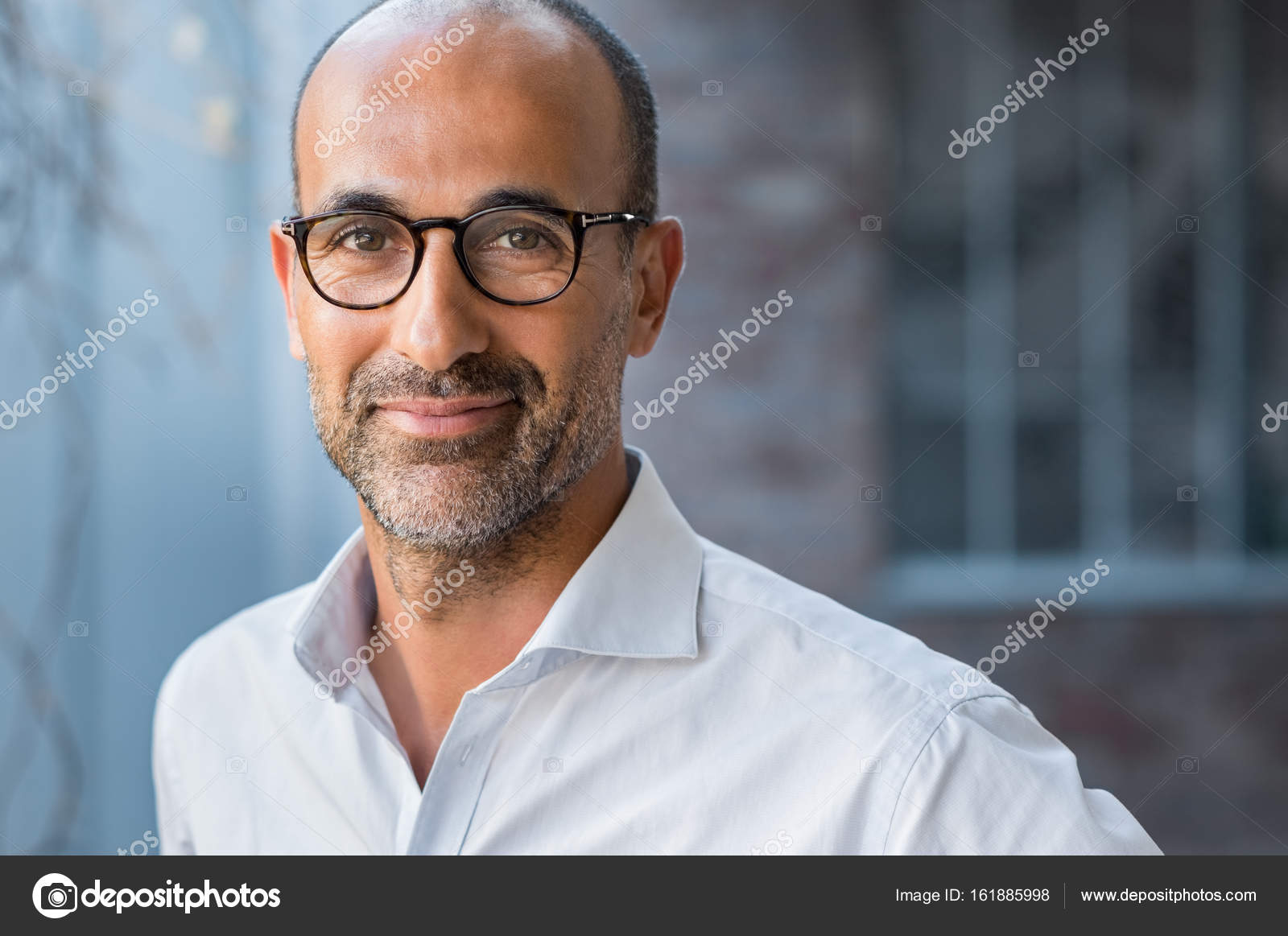 Mature mixed race man smiling Stock Photo by ©ridofranz 161885998 Mature mixed race man smiling Stock Photo by ©ridofranz 161885998