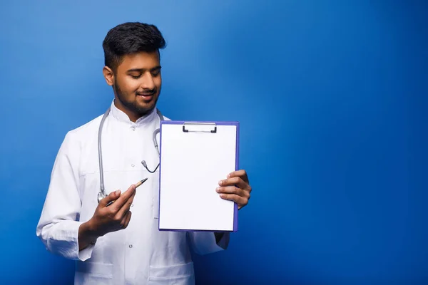 Indian doctor writing prescription Stock Photos, Royalty Free Indian ...