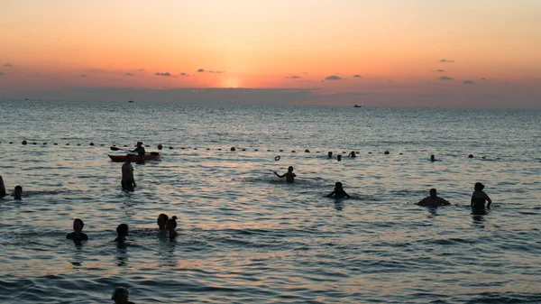 Beach sunset people Stock Photos, Royalty Free Beach sunset people ...