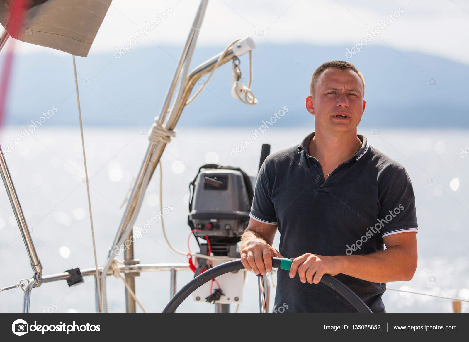 Skipper on sailing boat Stock Photo by ©dimaberkut 135068852
