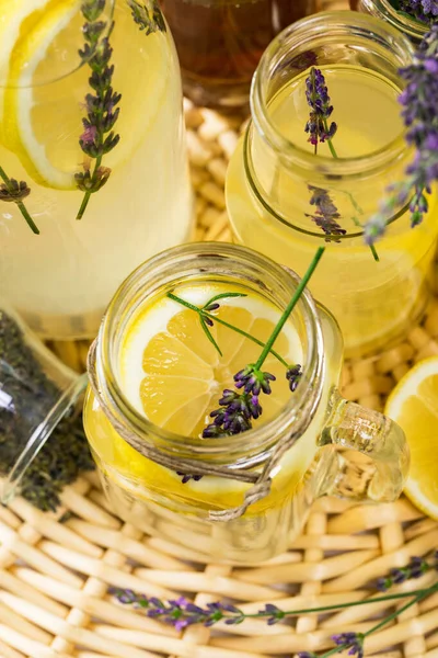 Lemonade with Lemons and Lavender. Cold Infused Detox Water with Lemon ...
