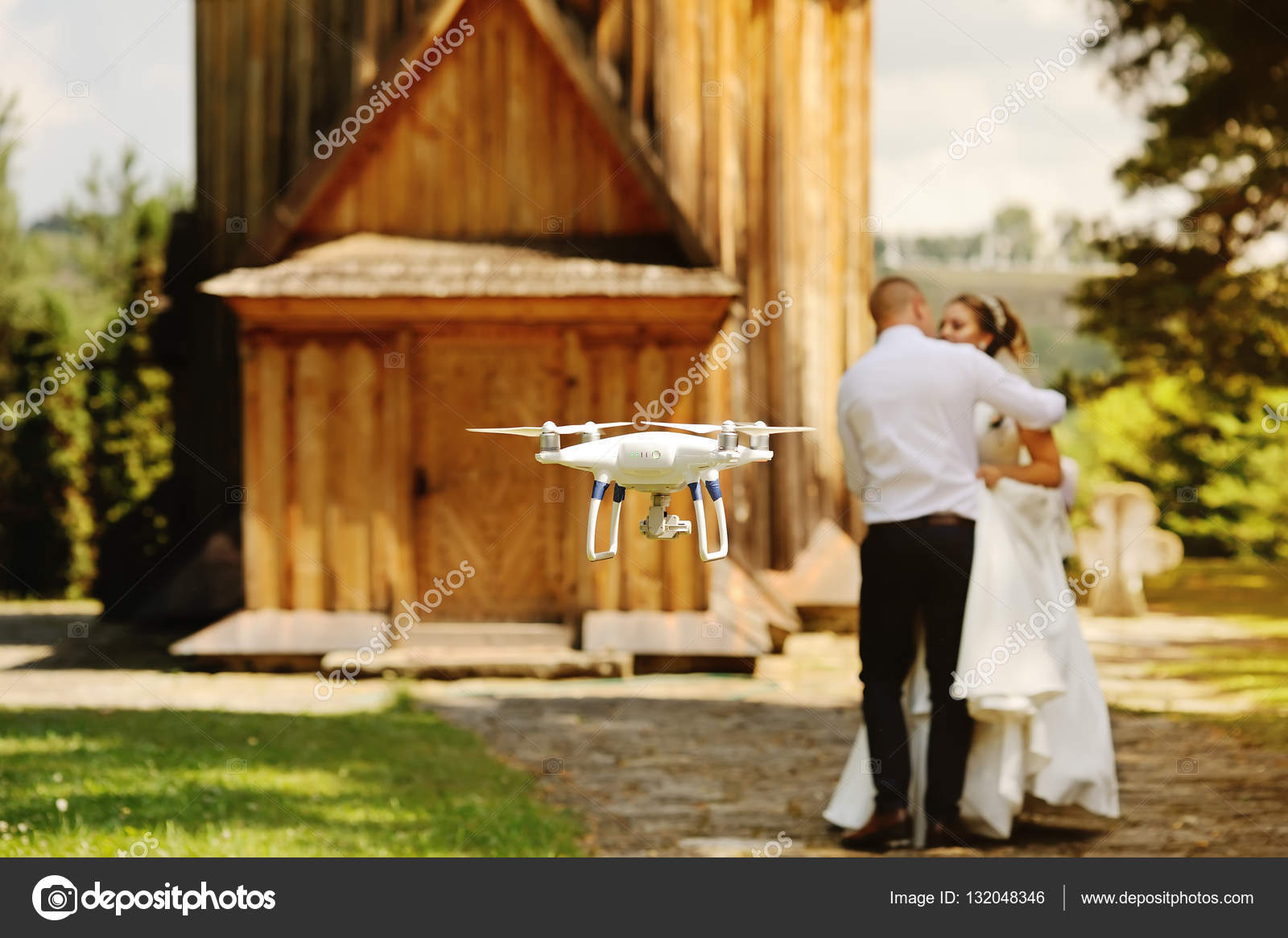 Dron filming a wedding couple — Stock Photo © manifeesto_v #132048346