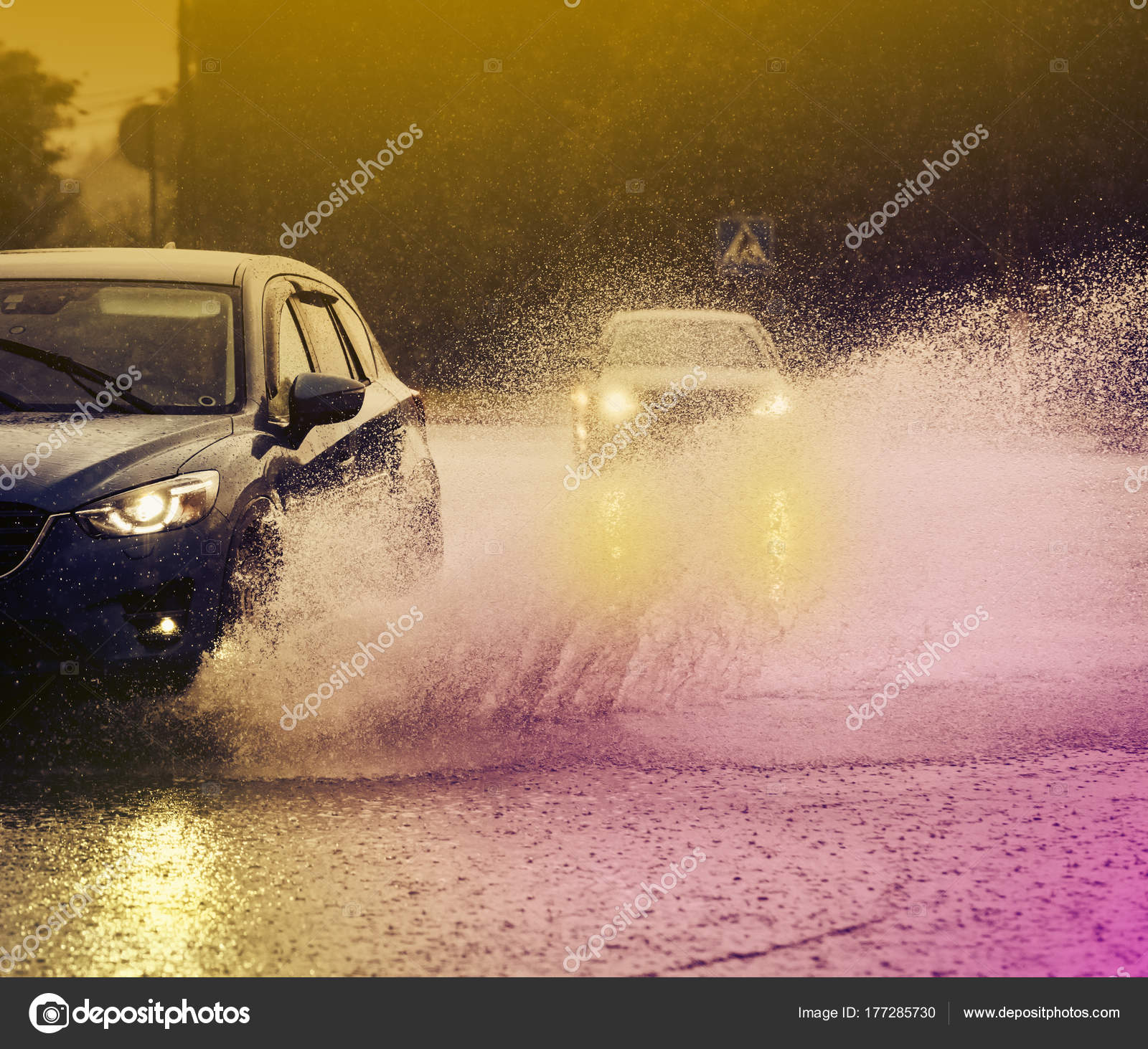 Car rain puddle splashing water — Stock Photo © db-rus #177285730