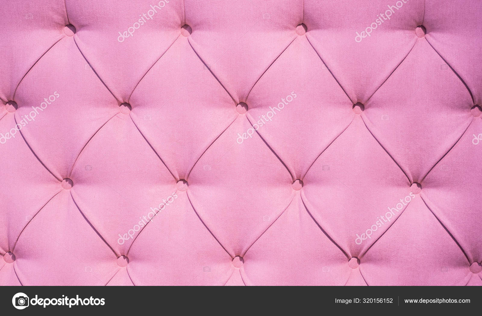Chesterfield style quilted upholstery backdrop close up. Capitone ...